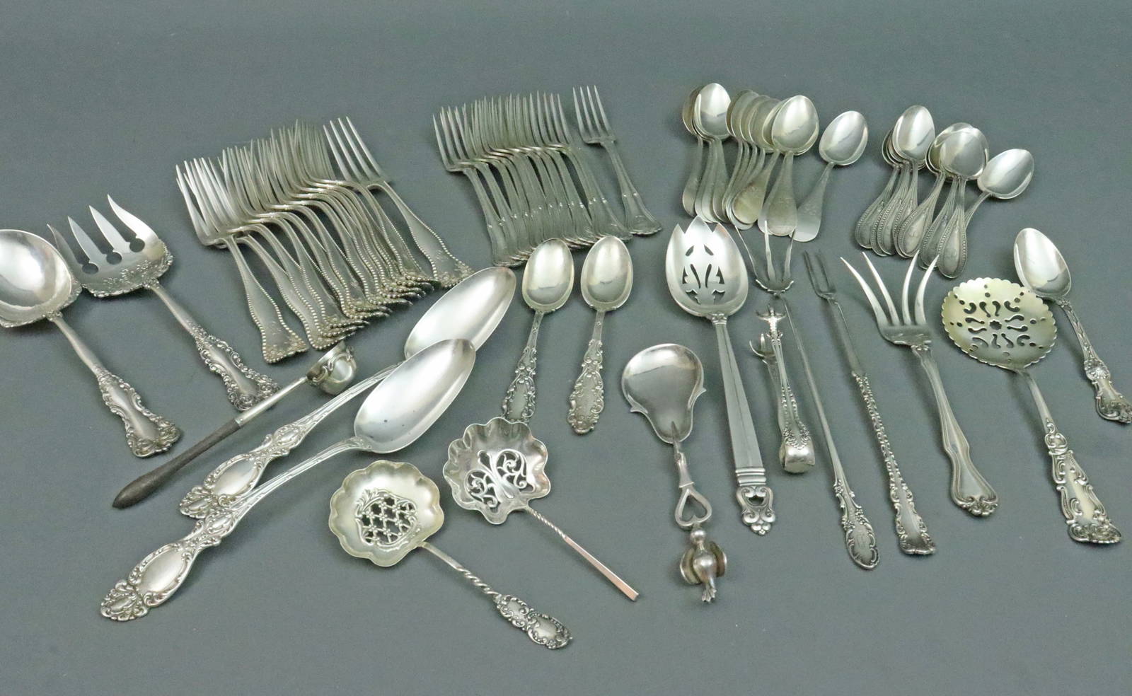 (62) Piece Assorted Sterling Flatware Group Auction