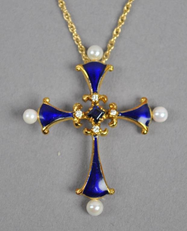 THE MIDNIGHT SAPPHIRE 14K CROSS BY IGOR FABERGE