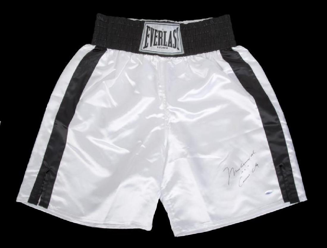 MUHAMMAD ALI AKA CASSIUS CLAY SIGNED BOXING TRUNKS