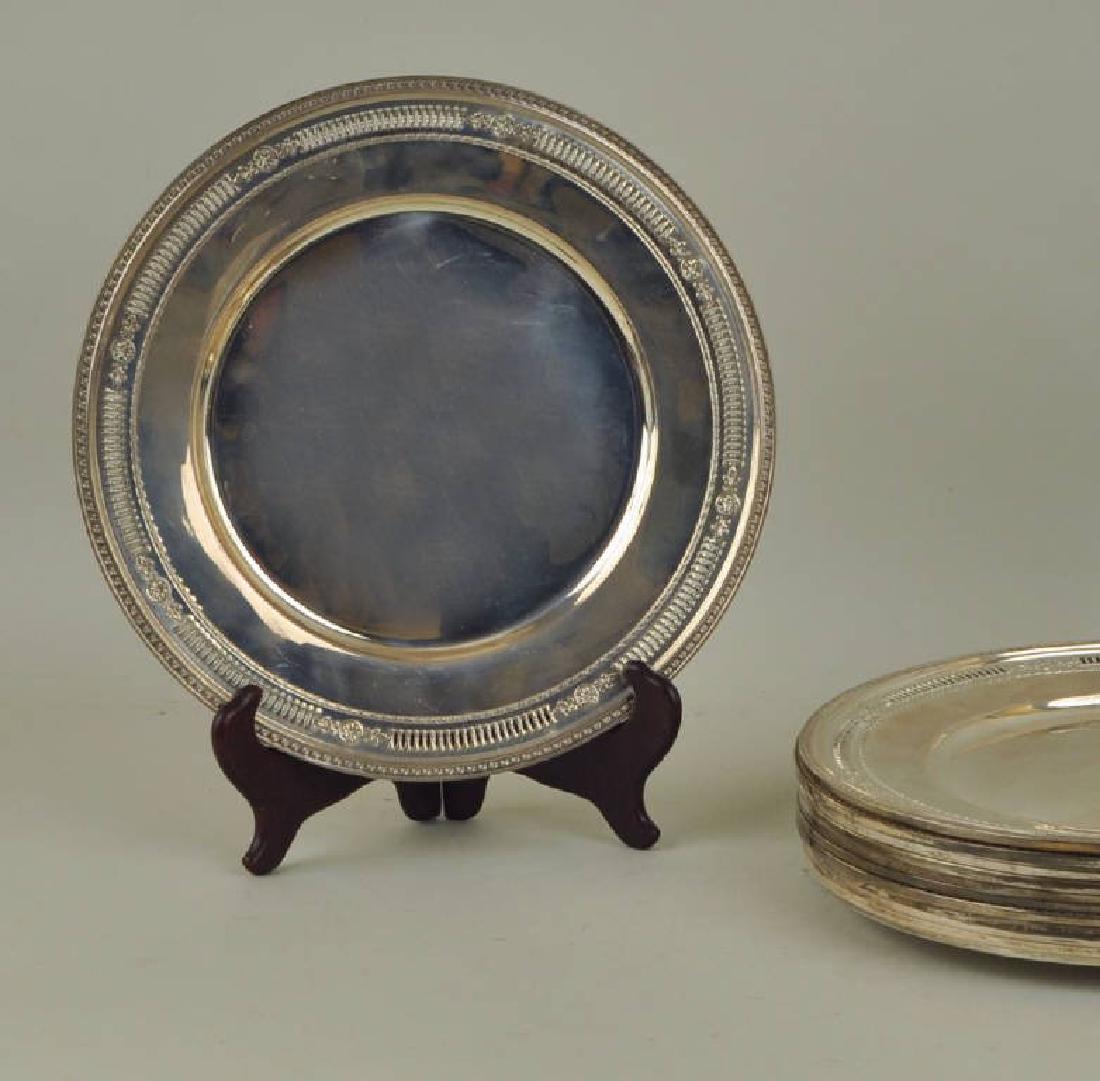 Twelve Sterling Silver Reticulated Service Plates