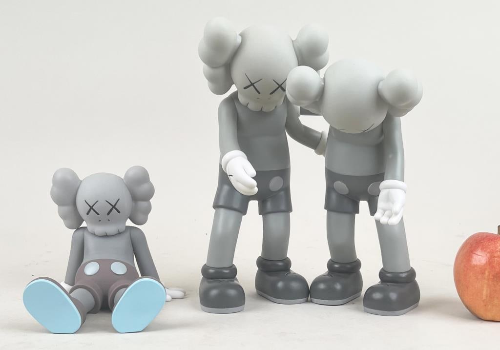 Group Three Kaws Vinyl Figures Auction