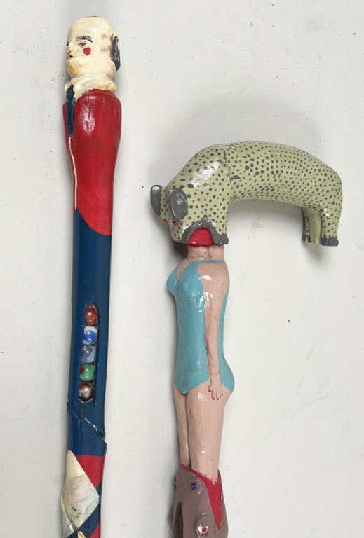 Two Folk Art Painted Walking Sticks Auction