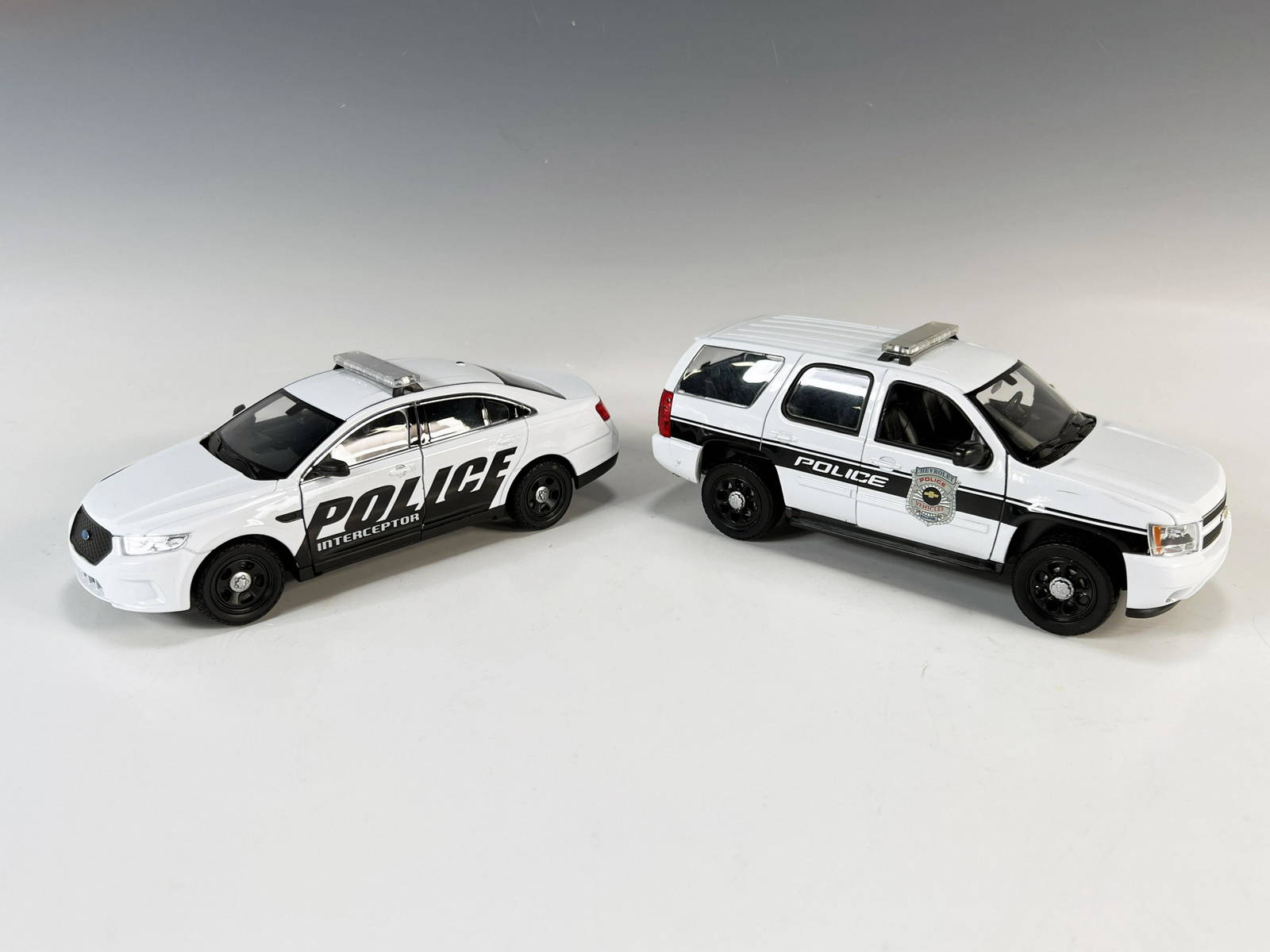Buy 2 SCALE MODEL POLICE CARS | Converse Auctions in PA