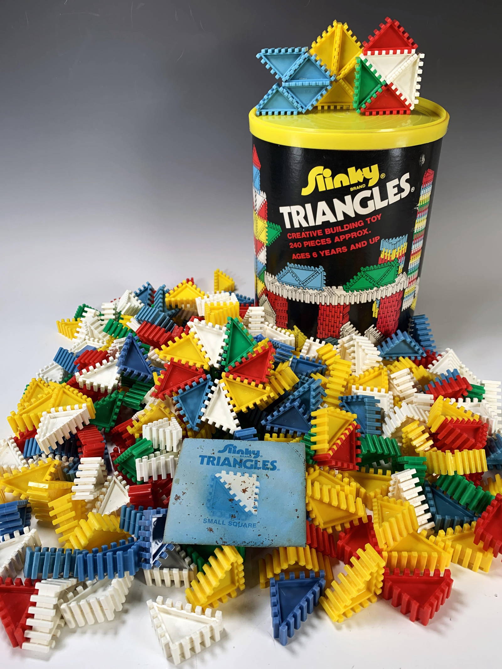 Buy Slinky Brand Triangles In Box | Converse Auctions In Pa