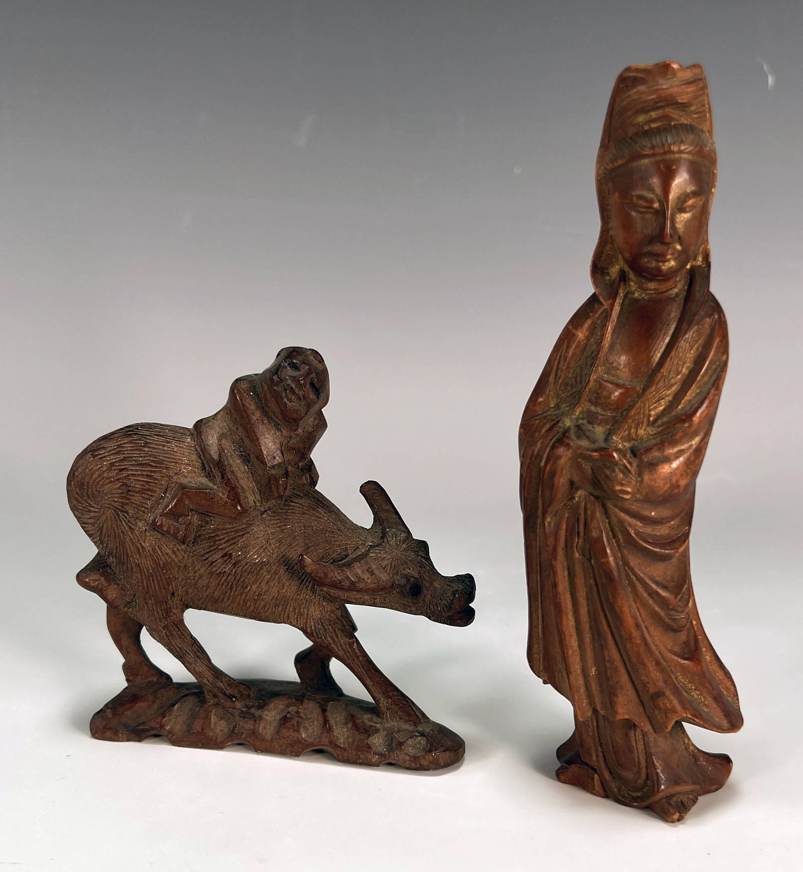 Carved Ox With Rider & Robed Figures Auction