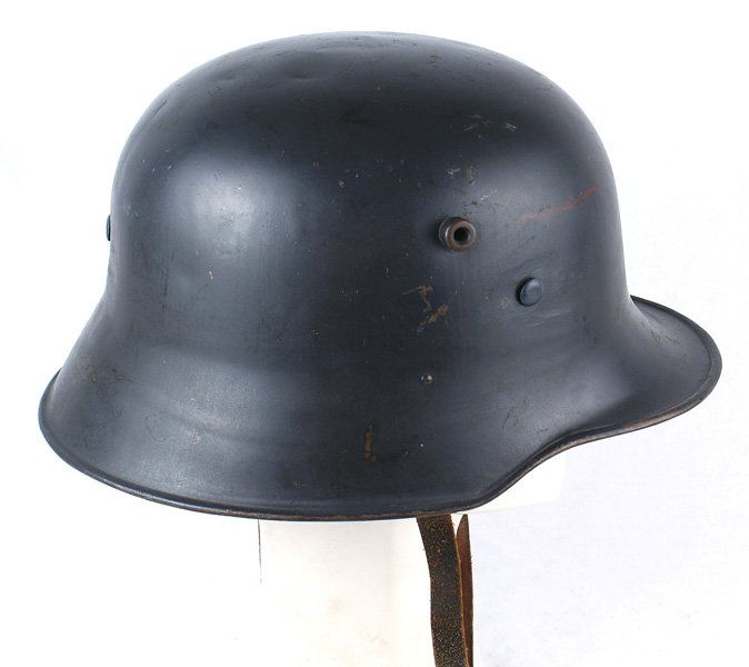 Die-stamped early SS issued helmet