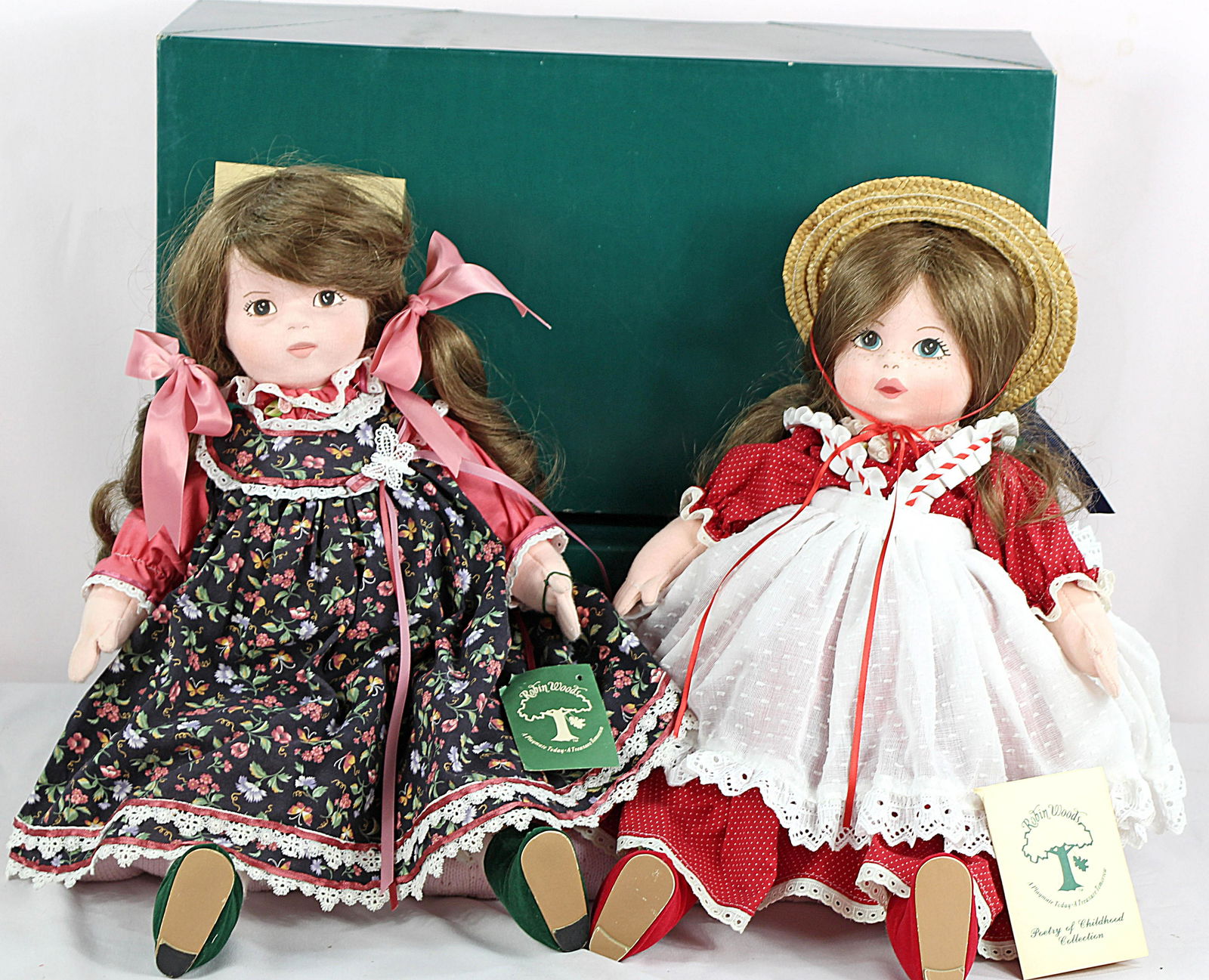 Four Robin Woods Cloth Dolls.