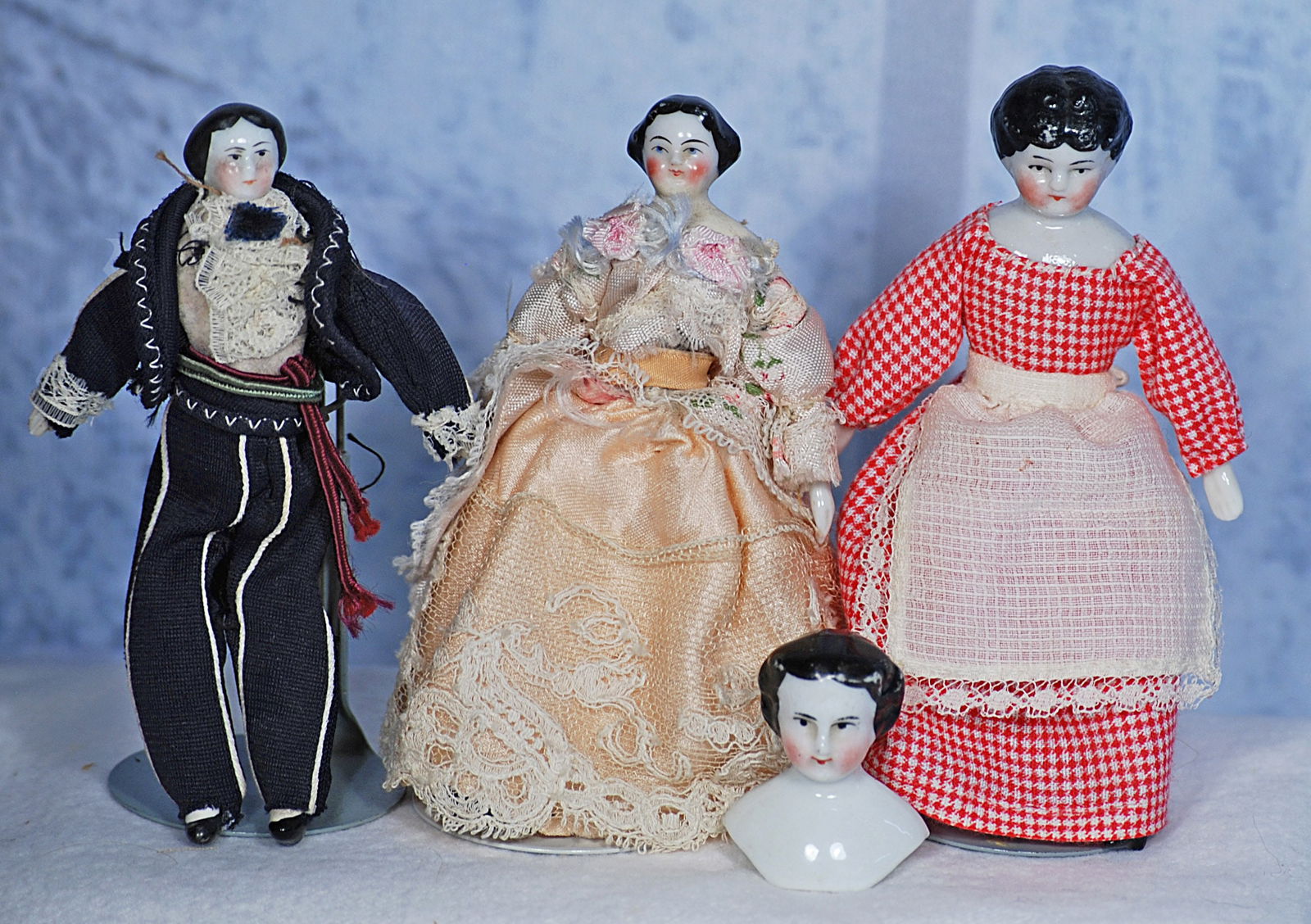 Three Doll House China Dolls & One Doll Head 4". Auction