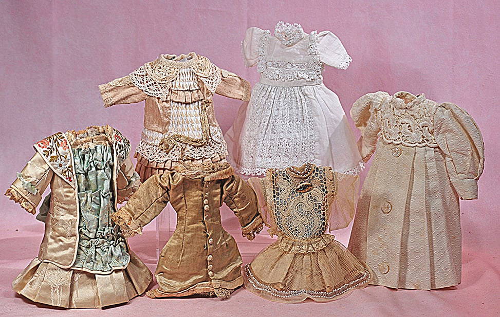 Six Doll Dresses Auction