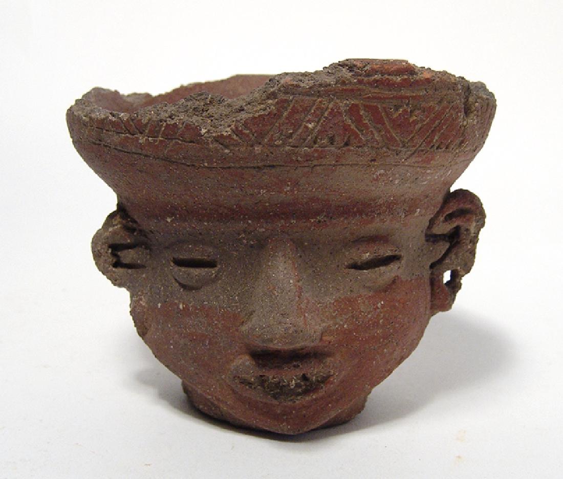 A Tarascan ceramic head vessel, Mexico