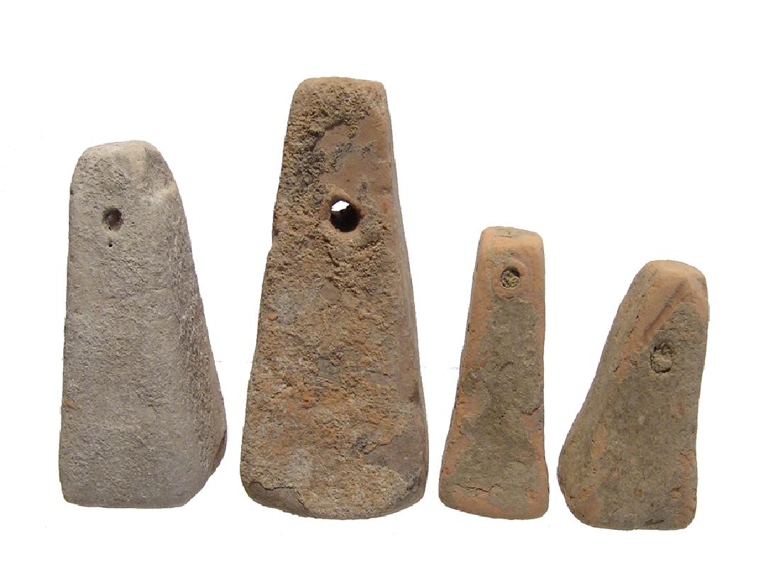 A trio of very large Greek pyramidal loom weights