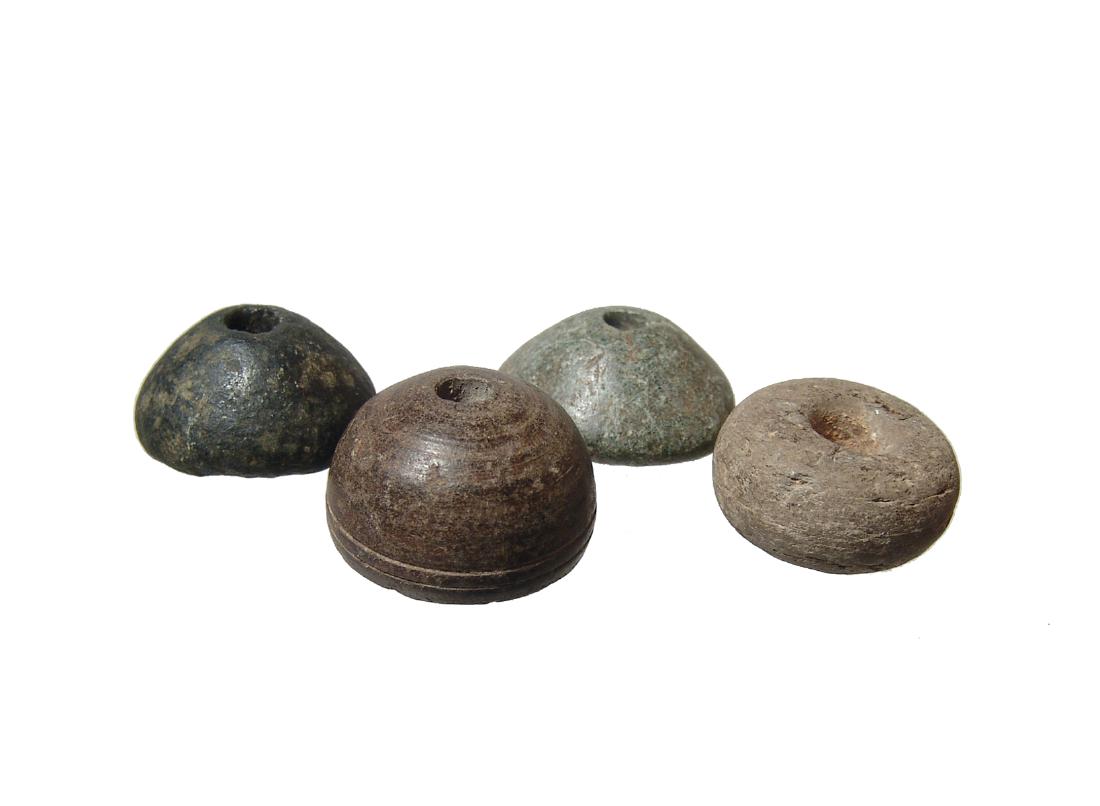 Group of 4 stone loom weights from the Holy Land