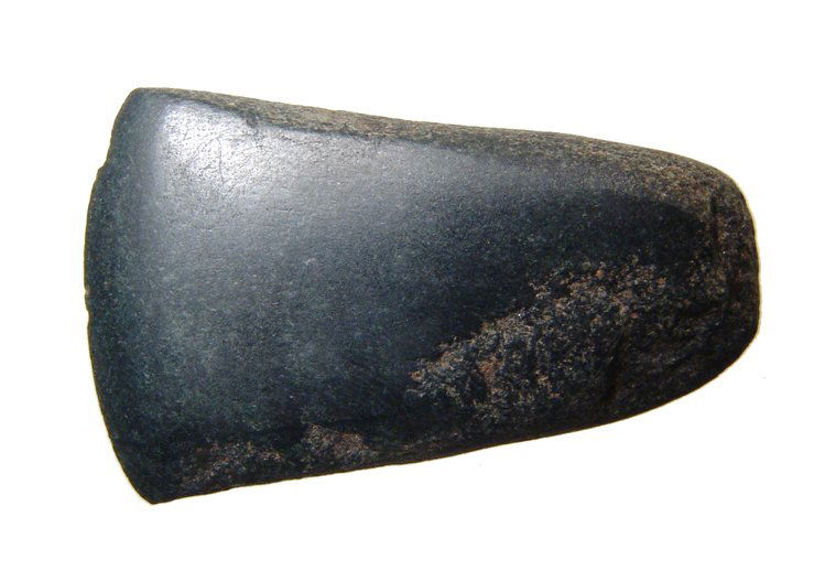 An Egyptian Predynastic basalt axe head