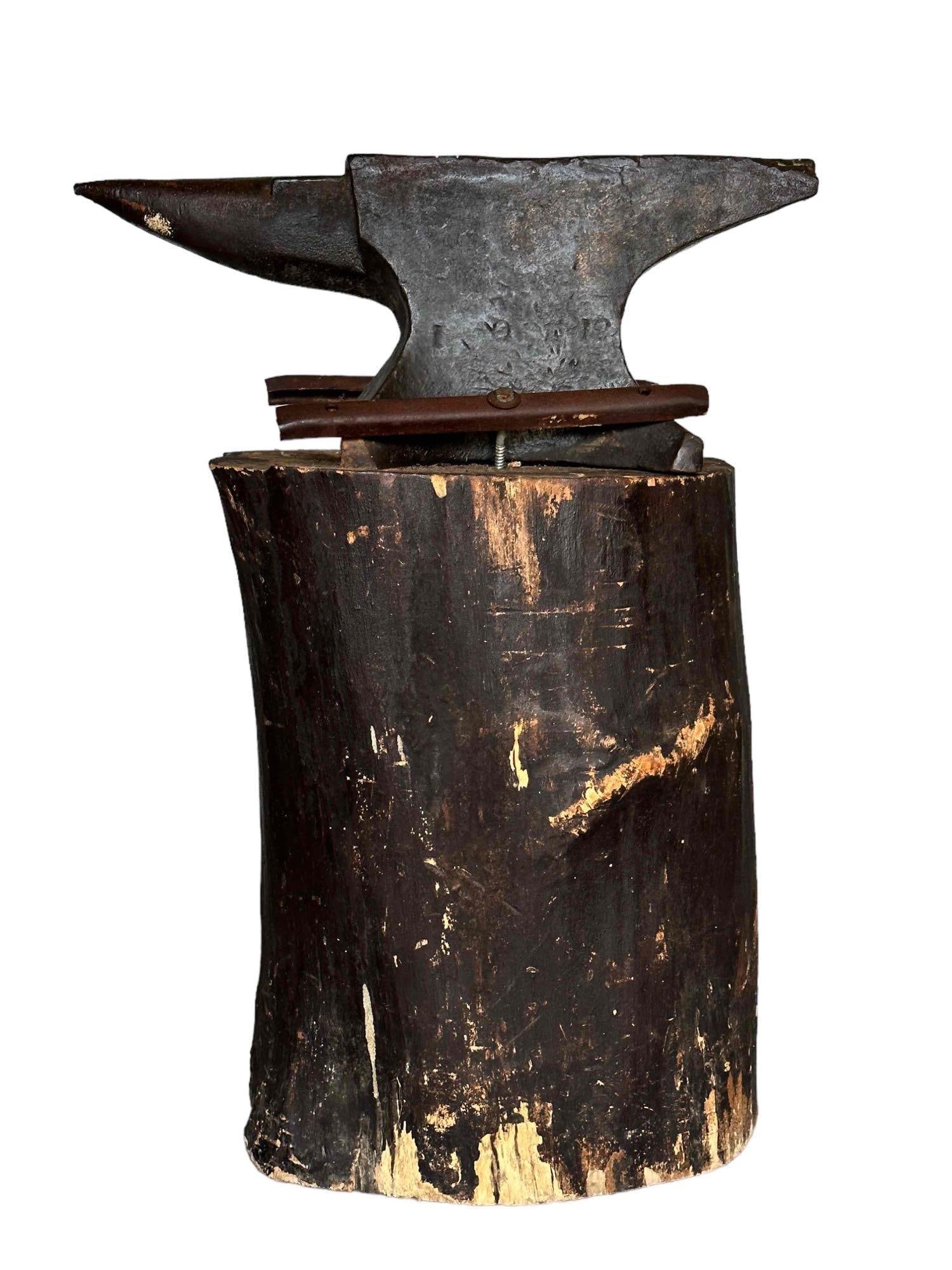Blacksmith Iron Anvil Mounted On Log Auction