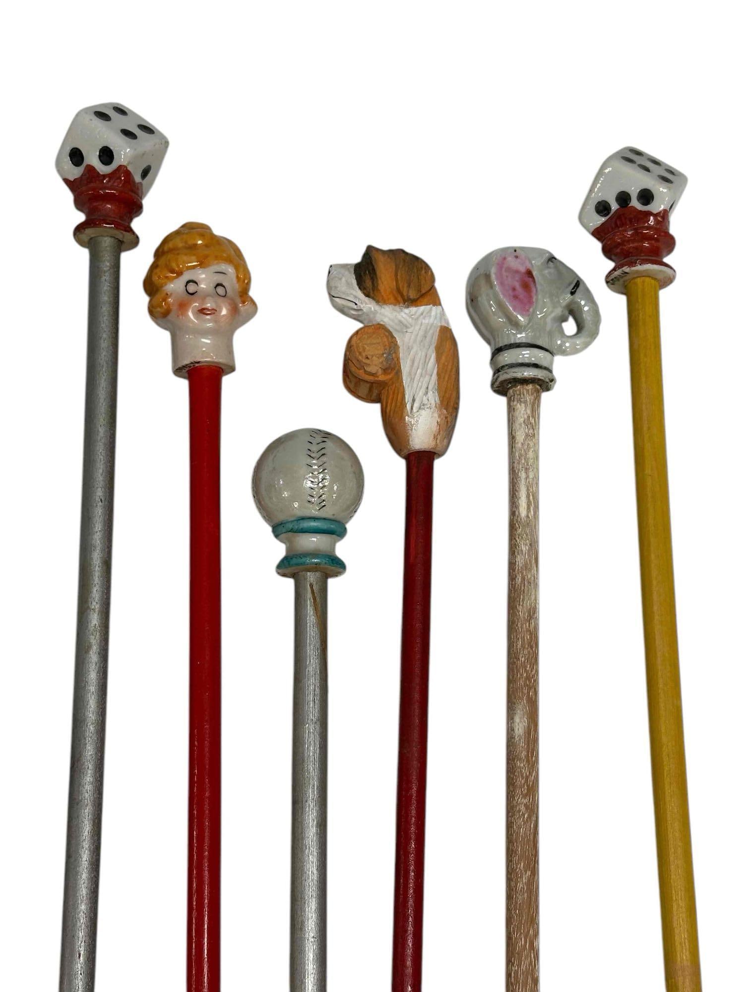 Six (6) Carnival / Circus Canes Auction
