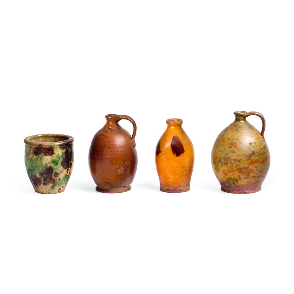 Four Glazed Redware Items, America, 19th Century. Auction