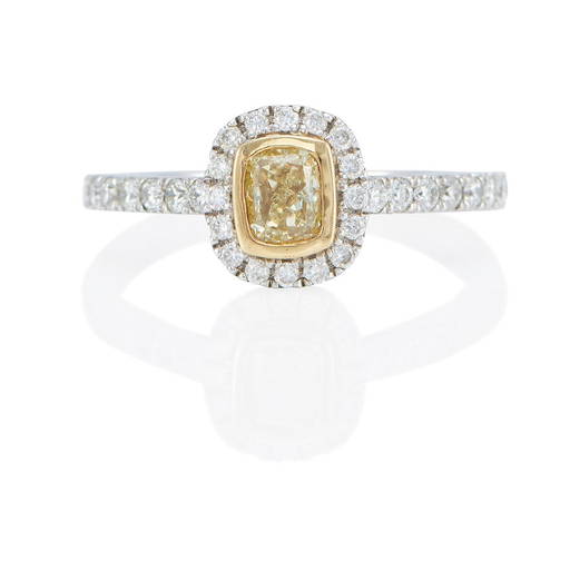 An 18k Bi Color Gold, Colored Diamond And Diamond Ring