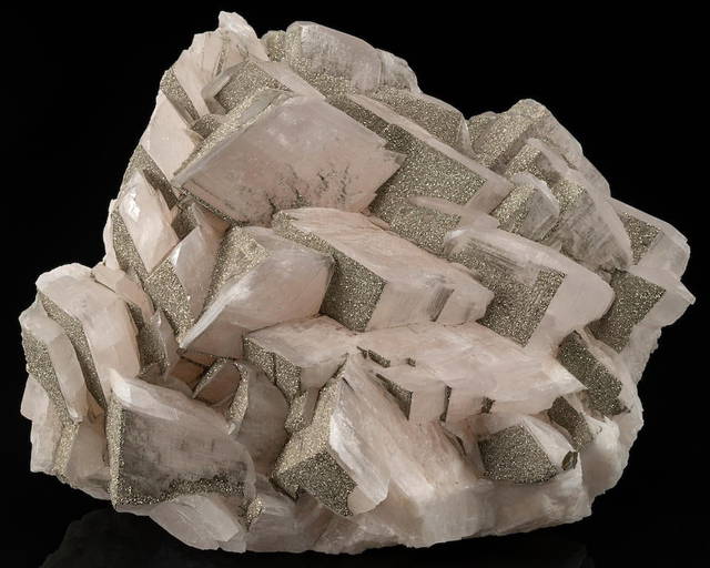 Pyrite Flecks On Calcite