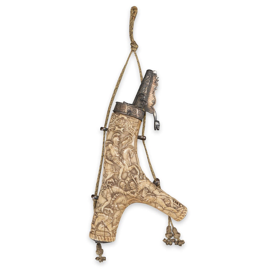 A 16th/17th Century-style Carved Powder Flask. Auction