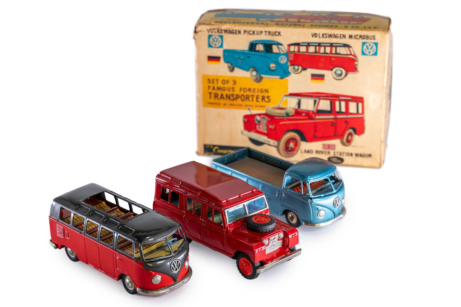 A 'set Of 3 Famous Foreign Transporters' Tinplate Car Toys Box Set, By ...
