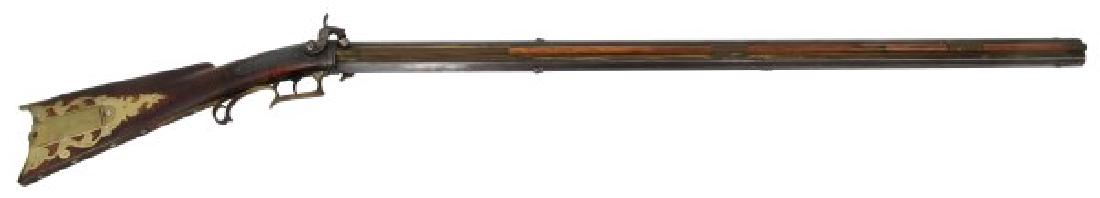 Over & Under Rotating Barrel Percussion Rifle