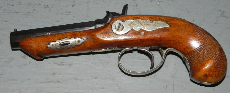 349: Percussion black powder derringer boot pistol.