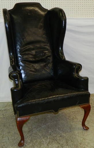 Black Leather Kittinger Wing Chair. 49" Tall.