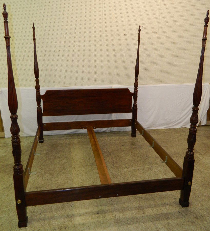 Henredon mahogany carved four poster king bed.
