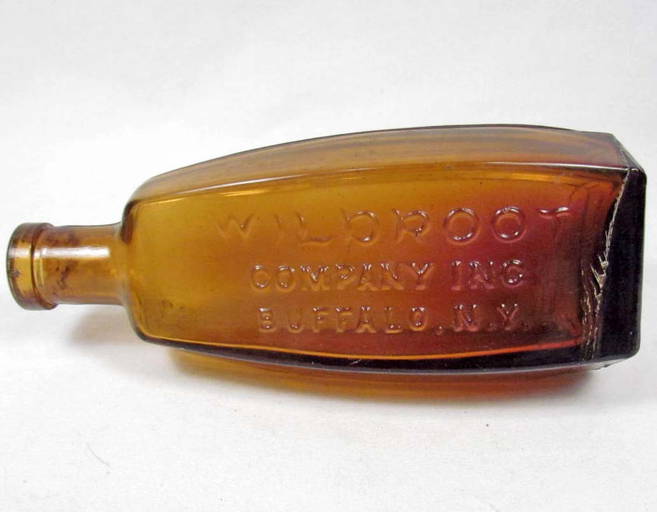 1448 Vintage Brown Glass Bottle " Wildroot Compa