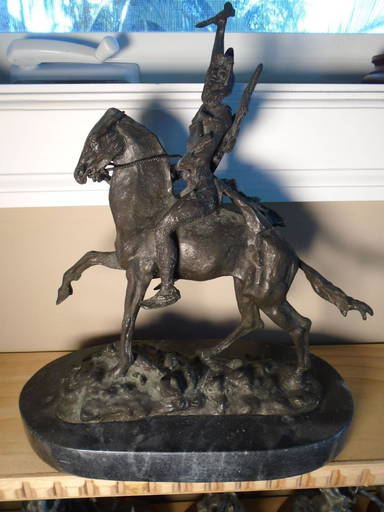 Indian Riding A Horse Bronze Sculpture