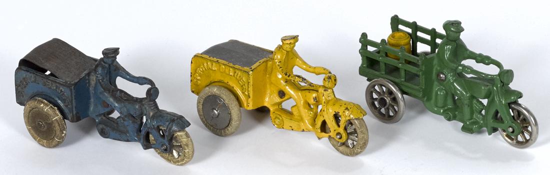Three Small Cast Iron Three Wheel Delivery Motorcycles,