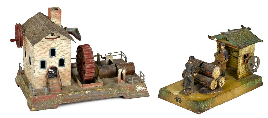Two painted and embossed tin steam toy accessories
