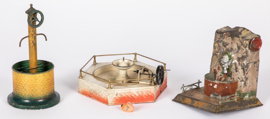 Three Painted Tin Fountain Steam Toy Accessories