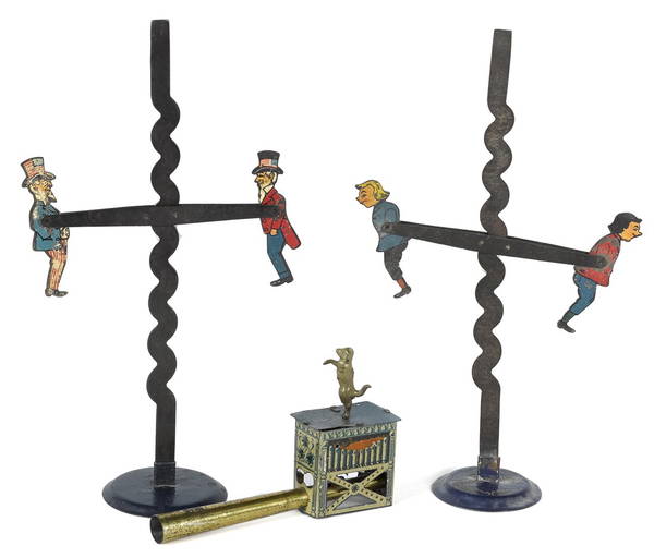 Tin Toys, To Include Two Seesaw Gravity Toys, O