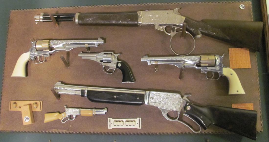 Western vintage toy gun display/Hubley,Nichols