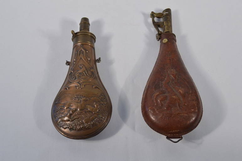 Two Gun Powder Flasks (1 Made Of Leather, 1 Brass)