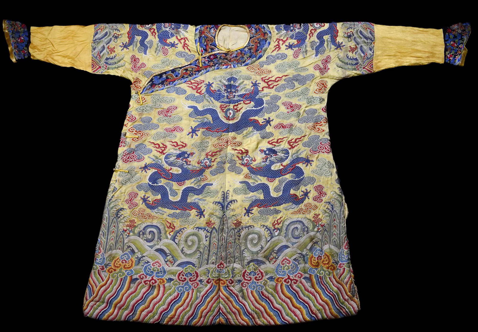 AN IMPERIAL YELLOW GROUND BROCADE EMBROIDERED 'DRAGON' ROBE.QING ...