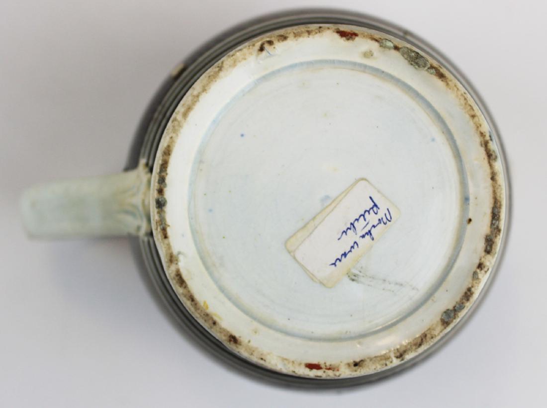 Mocha dendritic decorated pitcher.