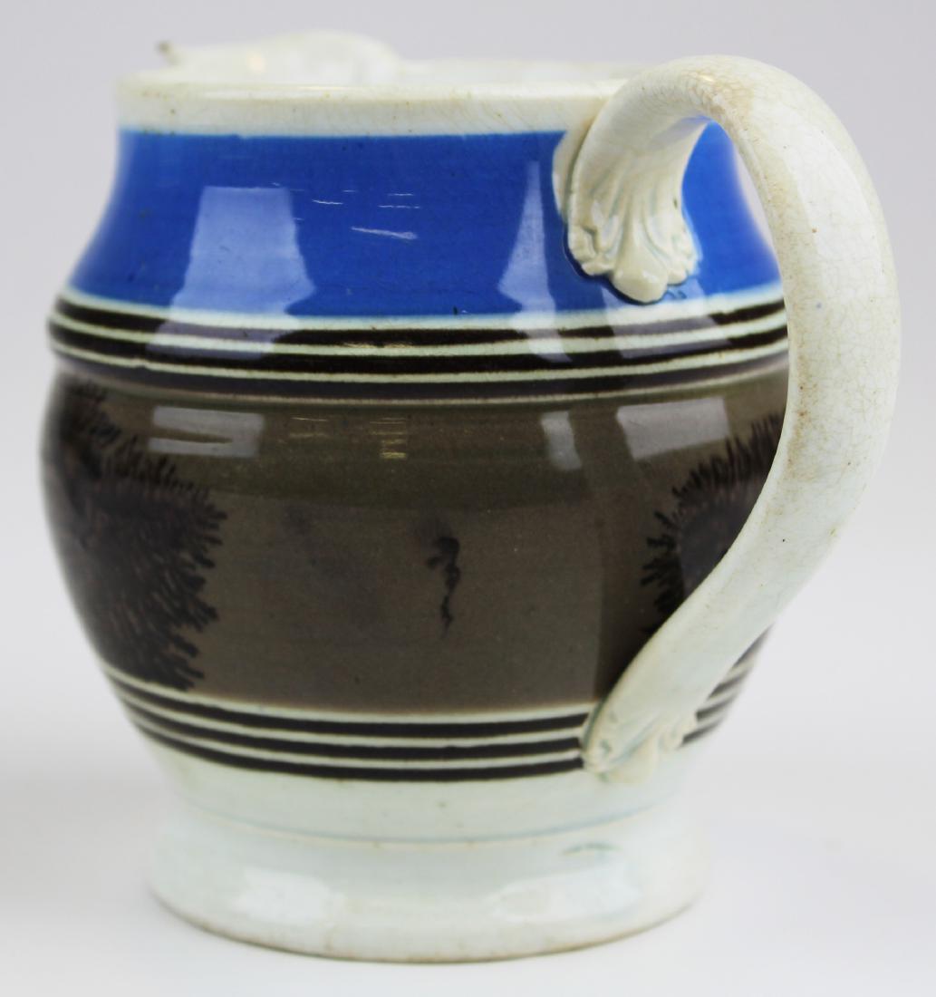 Mocha dendritic decorated pitcher.