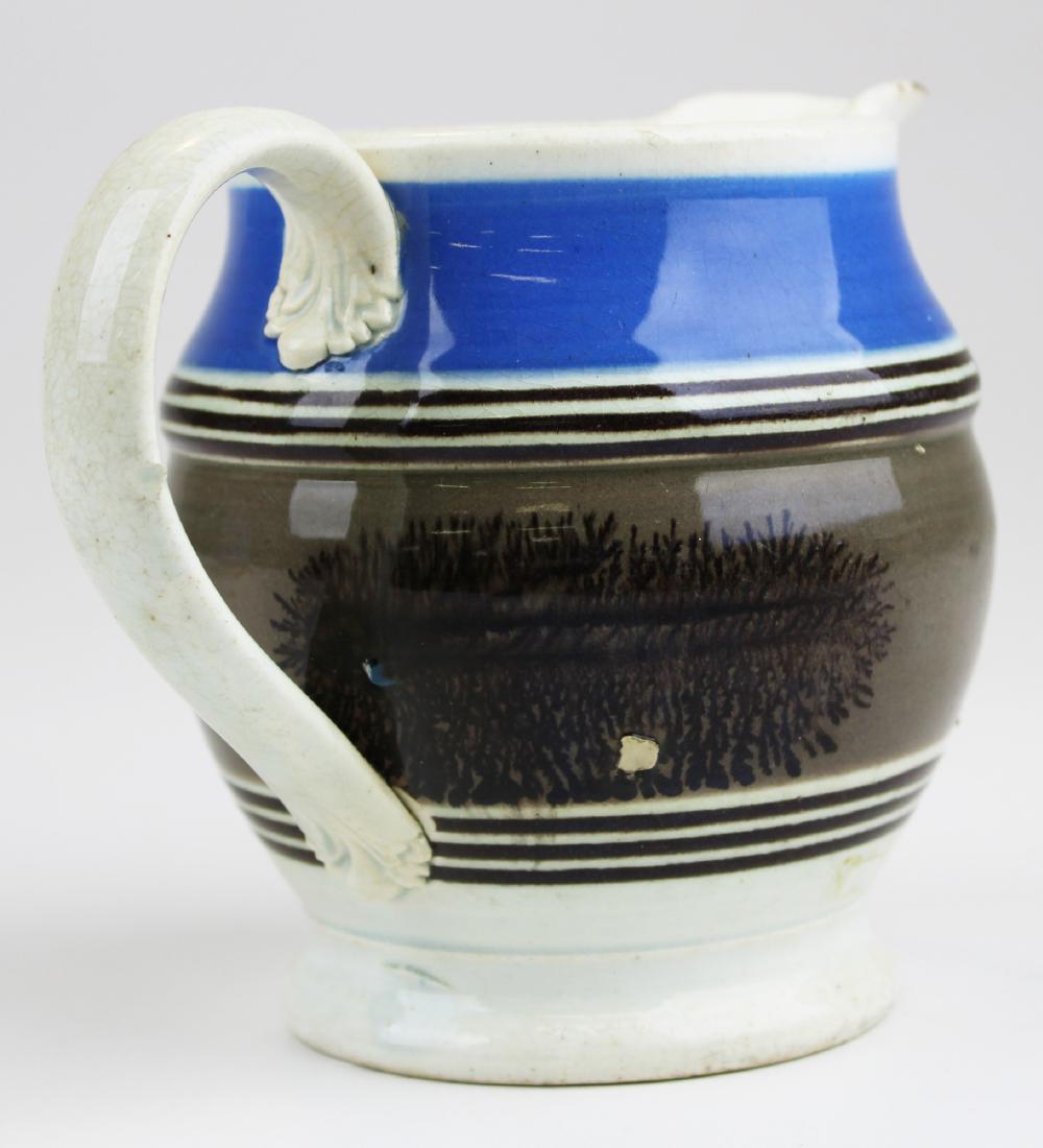 Mocha dendritic decorated pitcher.