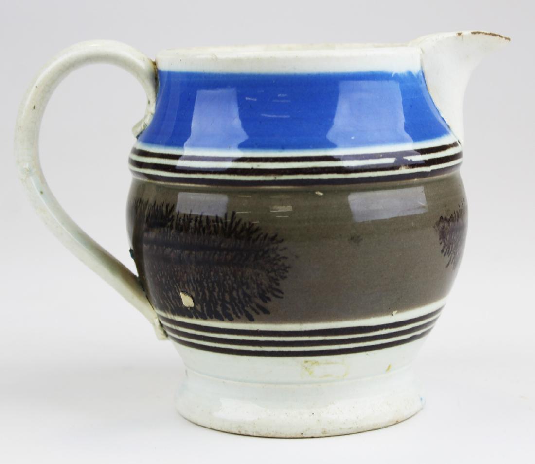 Mocha dendritic decorated pitcher.