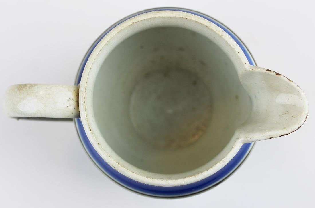 Mocha dendritic decorated pitcher.