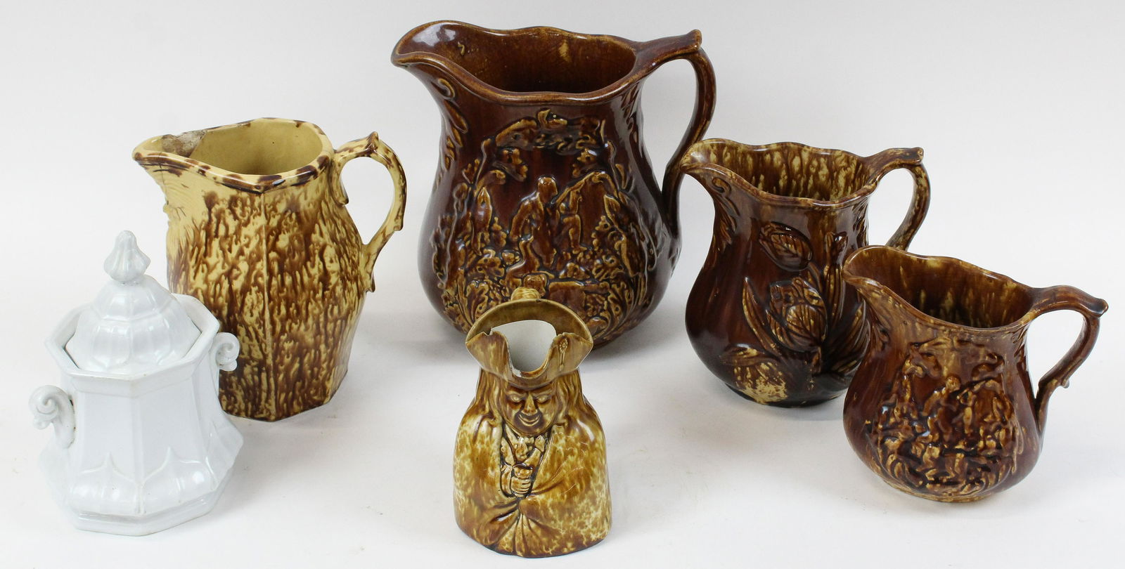 Bennington And Rockingham Pottery Pitchers