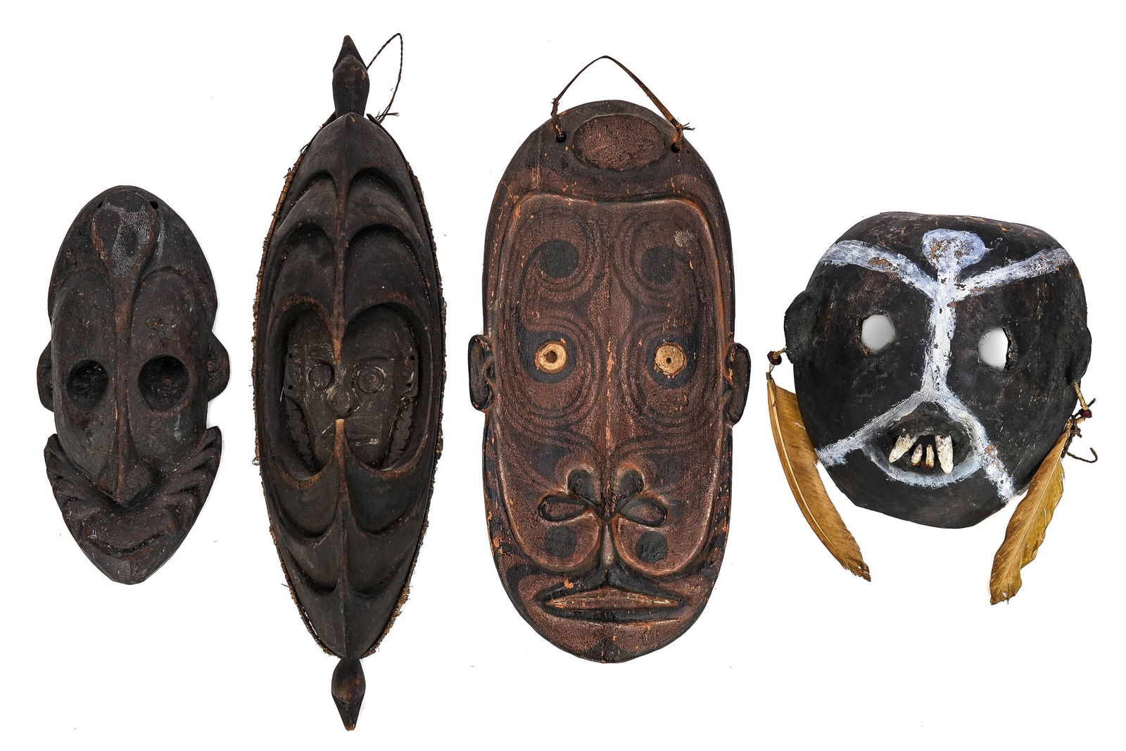 Four Papua New Guinea Masks Auction