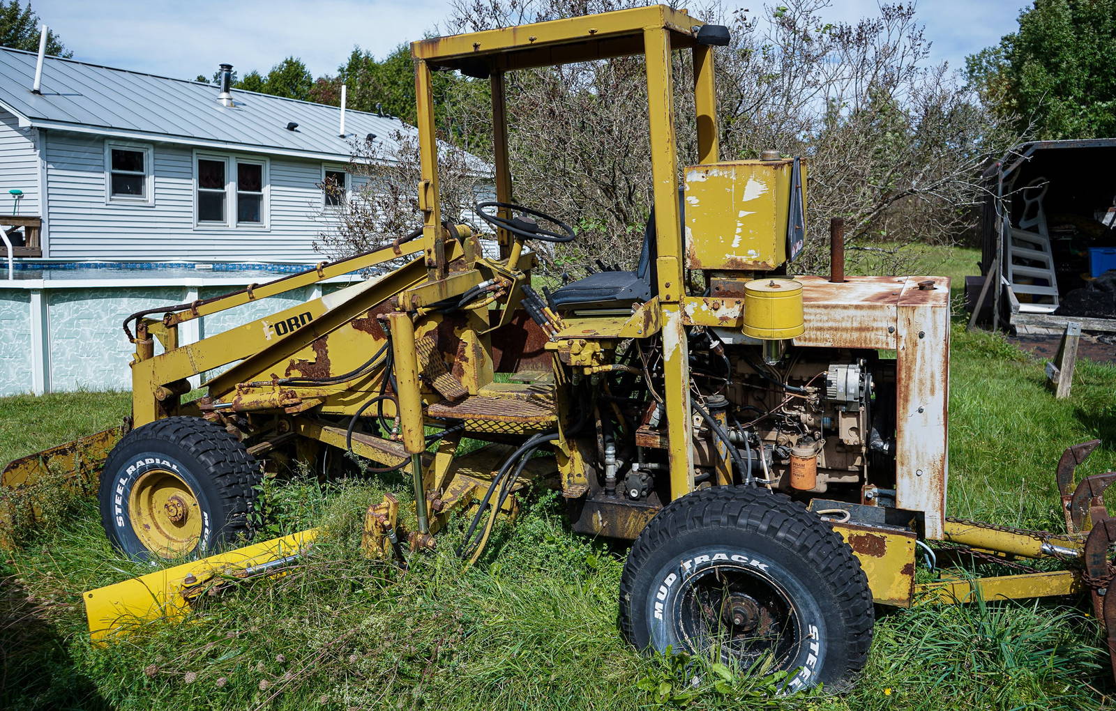 Ford Road Grader With And Extra Set Of Studded Tires Auction