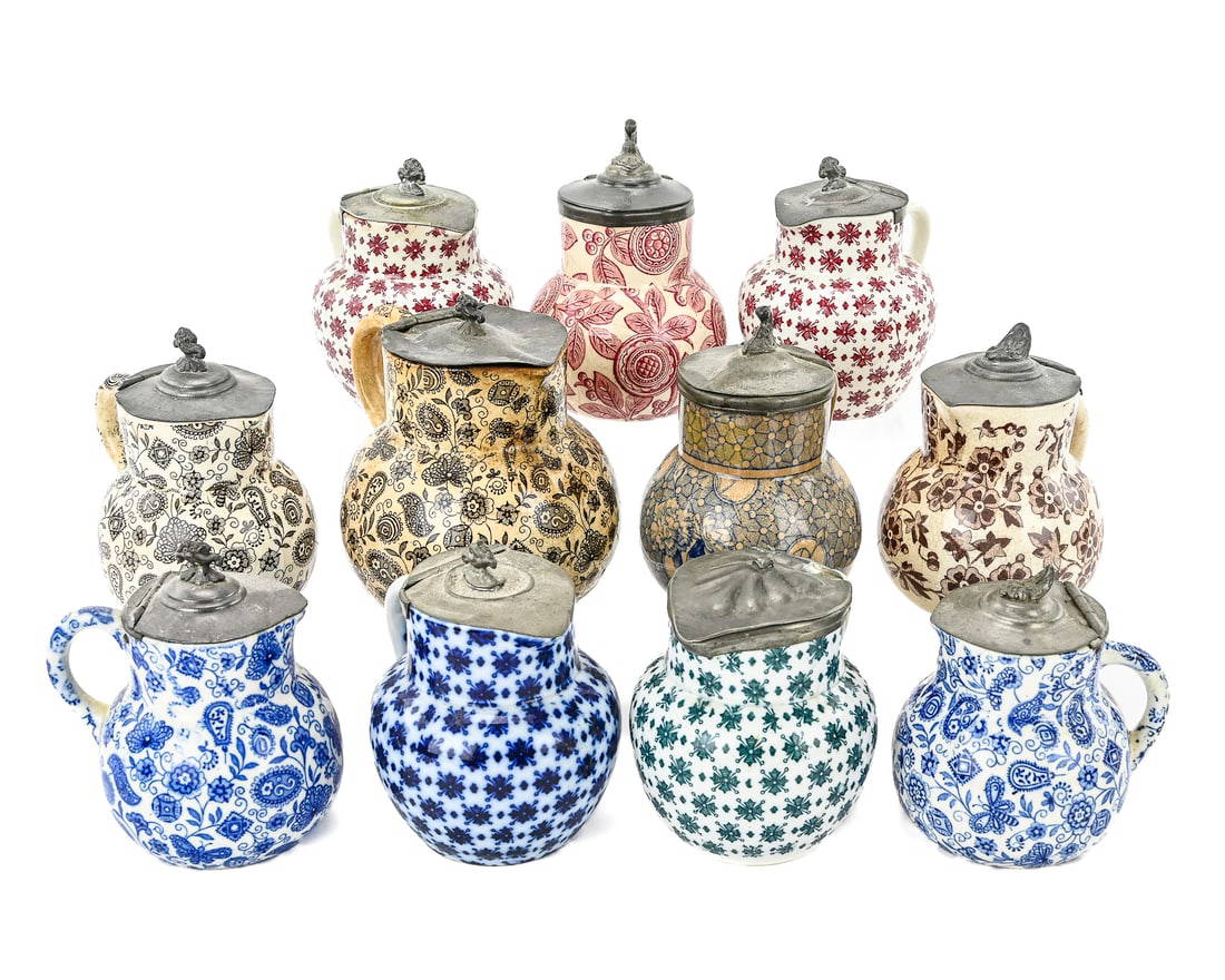 11 Intricately Patterned Porcelain Pitchers Auction