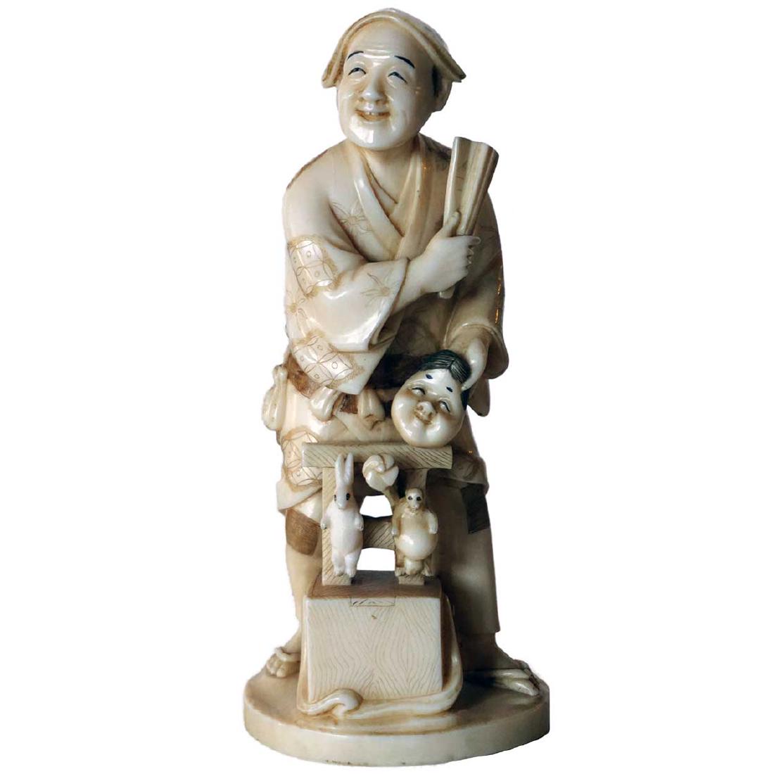 Signed Japanese Okimono Of A Merchant With Rabbits