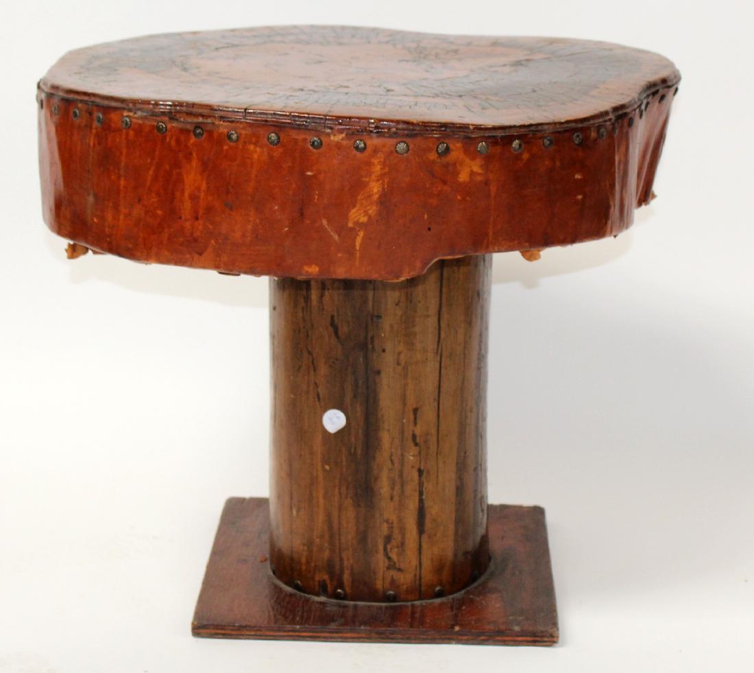 Naturalistic form leather wrapped side table
