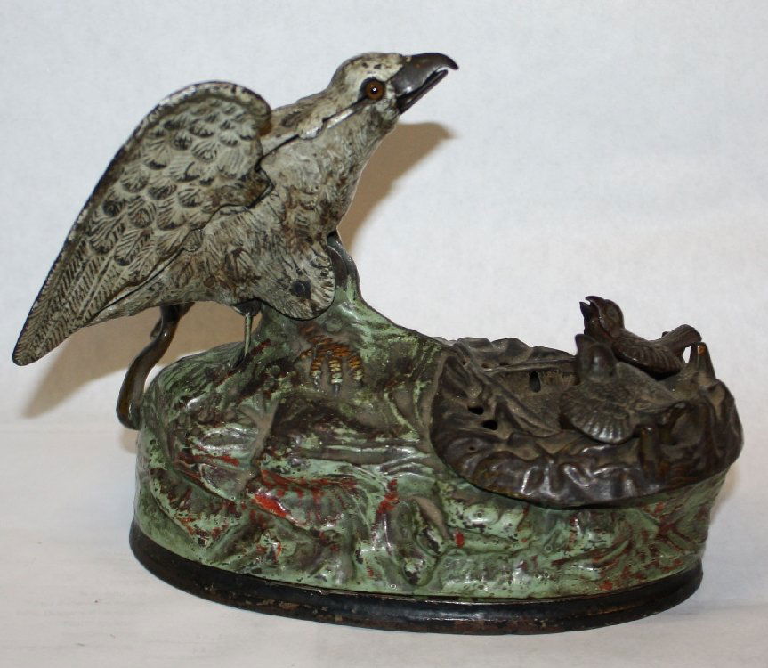 Antique American cast iron bird bank