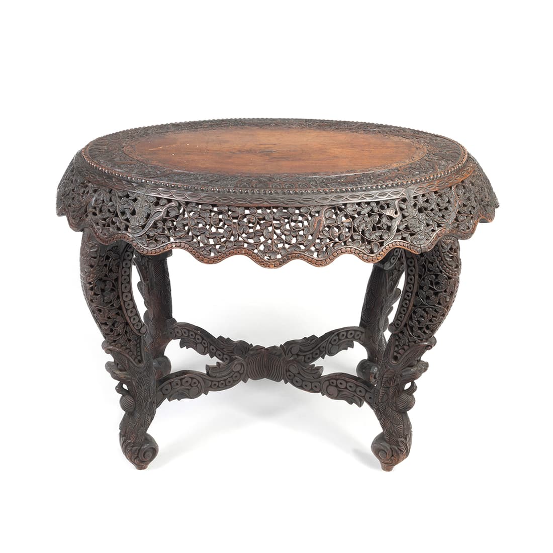 A Oval Form Carved Indian Table Auction